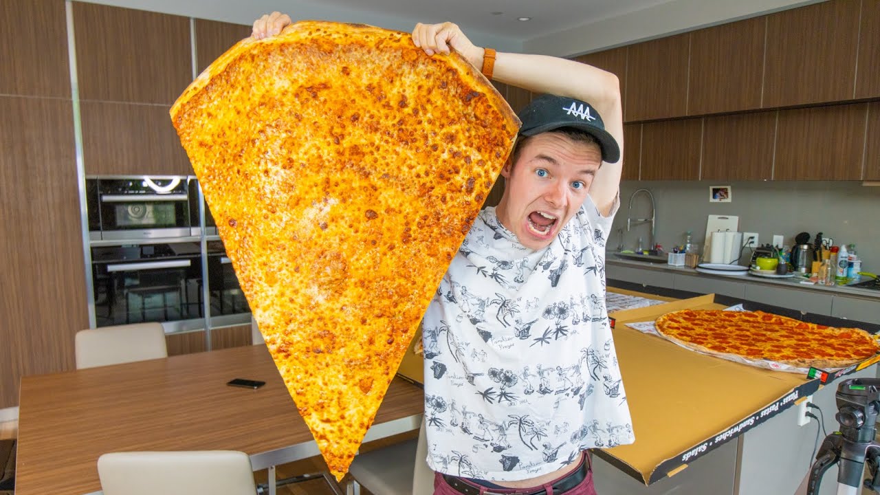 Eating the world's biggest slice of pizza!