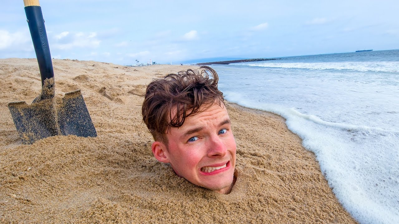 Trapped deep inside beach sand for a full twenty four hours