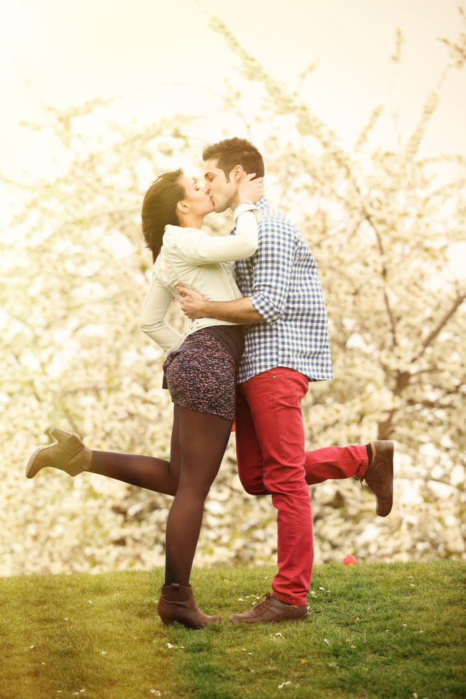 How does science explain the sensations of a kiss?