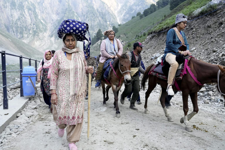PM Modi greets Amarnath Yatra pilgrims PM Modi greets Amarnath Yatra pilgrims