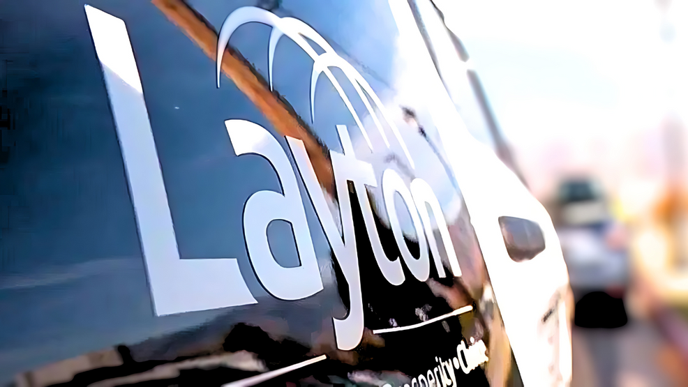 SWAT members serach suspect after gunfire heard in Layton neighbood