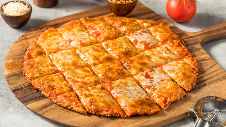 What's The Difference Between Chicago Deep Dish And Tavern-Style Pizza?