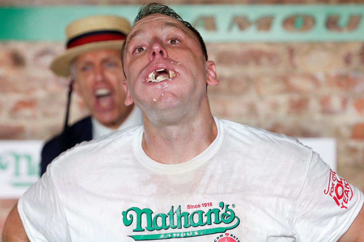 What is the Nathan's hot dog eating contest record? List of champions ...