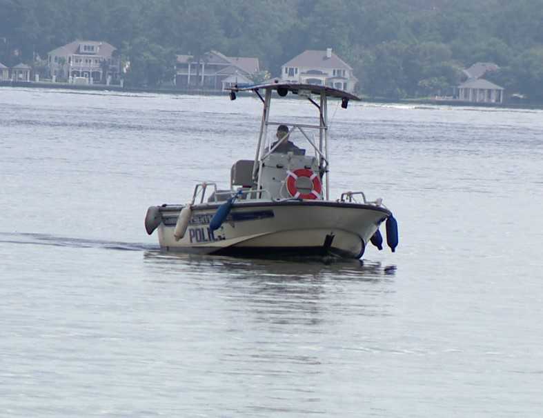 Law enforcement officers enforcing boating safety during holiday weekend