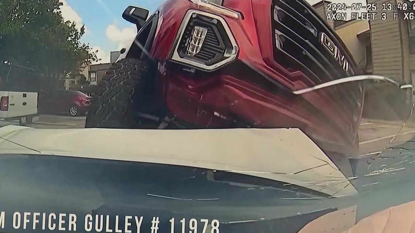 Dallas PD releases video of police shooting, officer's car being rammed Dallas PD releases video of police shooting, officer's car being rammed