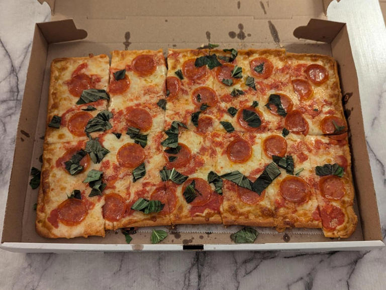 The Best Way To Cook Frozen Pizza Isn't What You Think It Is