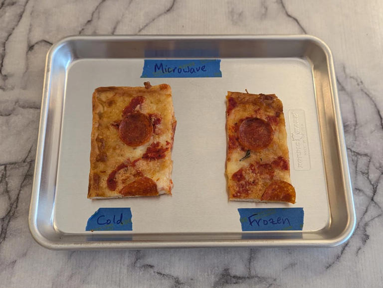The Best Way To Cook Frozen Pizza Isn't What You Think It Is