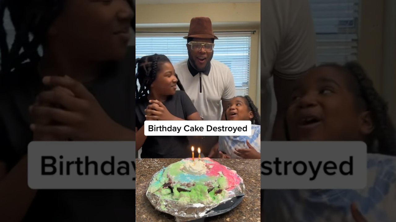 Siblings destroy birthday cake in just a few seconds
