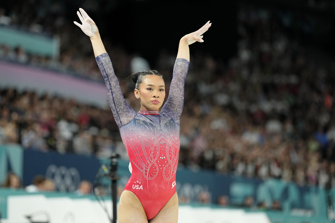 Pictures of American Olympian and first-time SI Swimsuit model Sunisa Lee