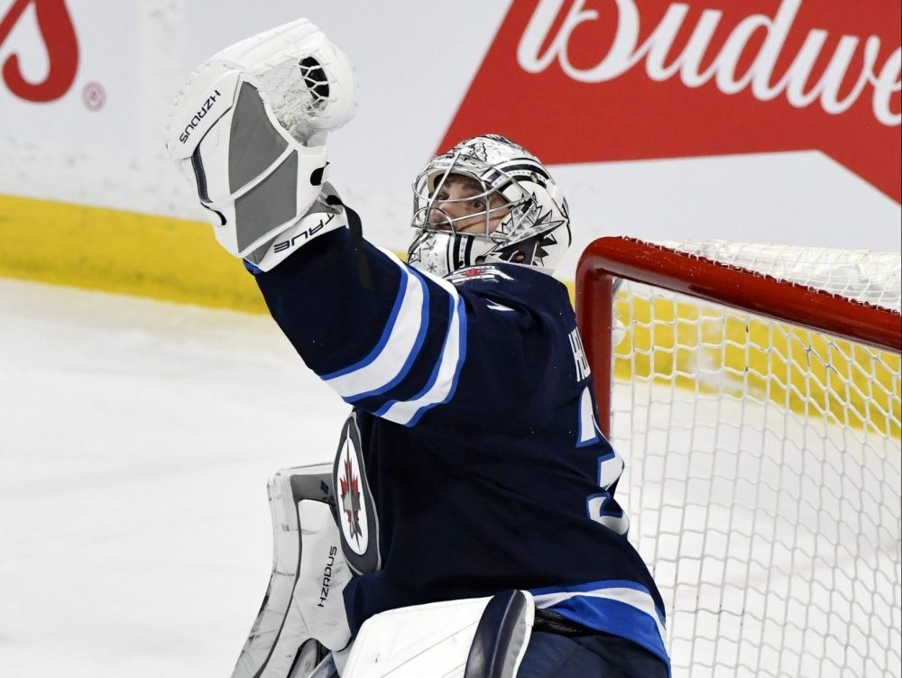 A celly for Helle: Jets goalie Connor Hellebuyck better than ever
