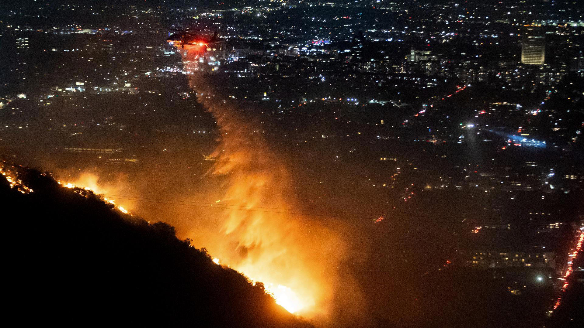 At least 5 killed and thousands evacuated as wildfires rage in California At least 5 killed and thousands evacuated as wildfires rage in California