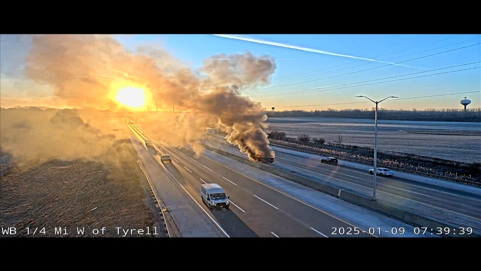Vehicle on I-90 in suburbs catches fire, sending huge clouds of smoke ...