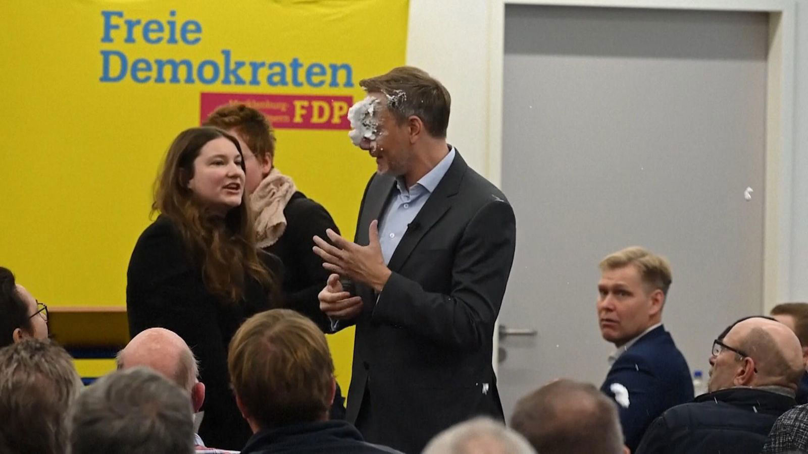 Politician slapped with cake in face Politician slapped with cake in face