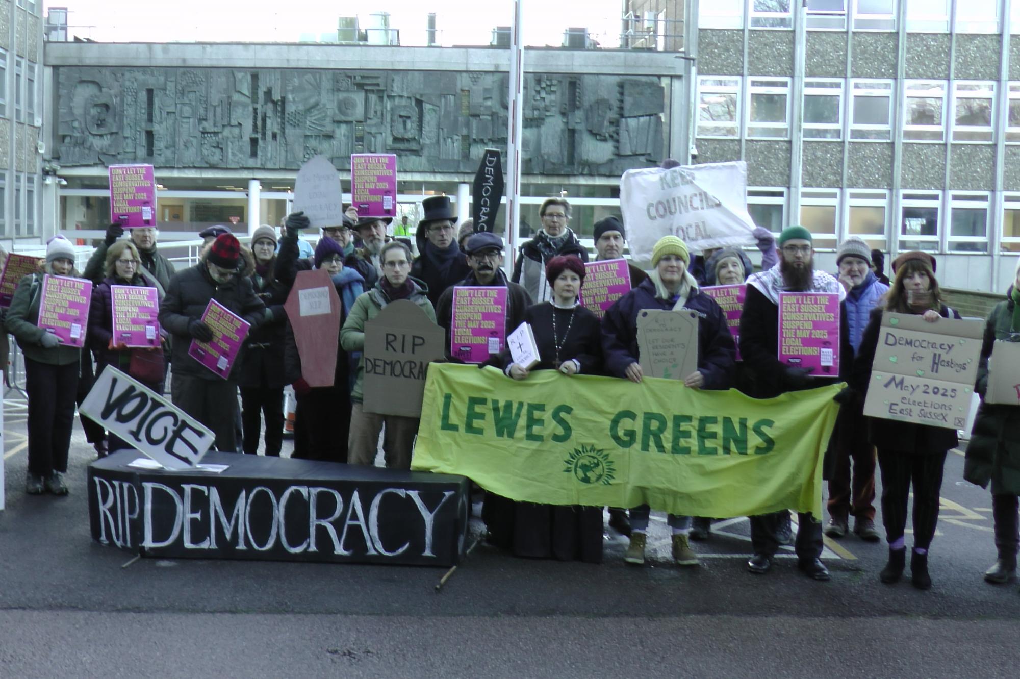 ‘RIP democracy’ signs at protest outside East Sussex County Council in ...