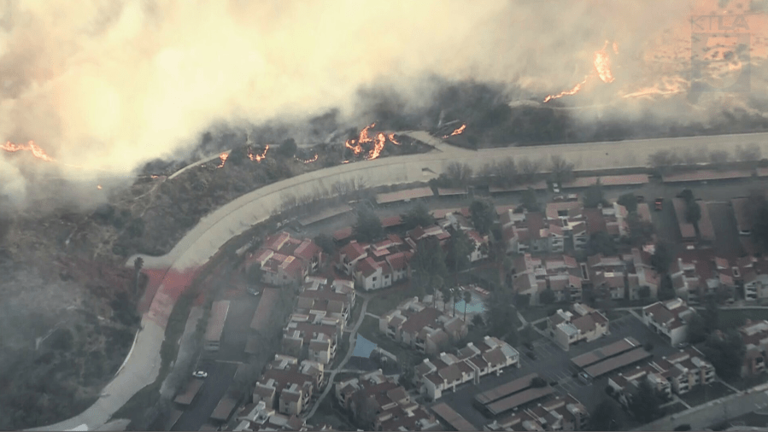Fire crews race to protect homes from new wildfire in Calabasas area