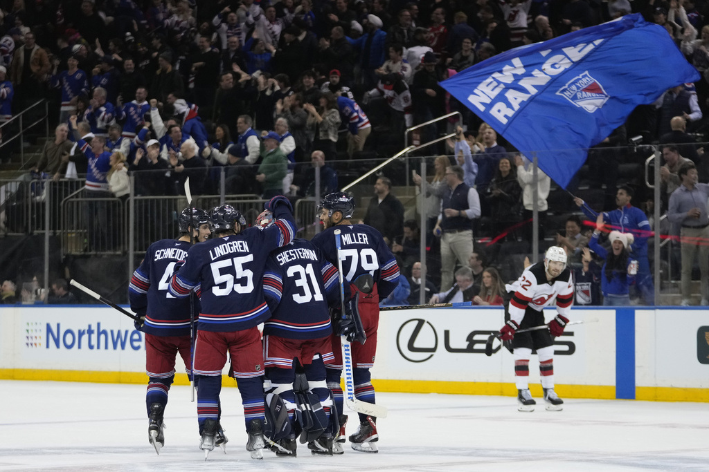 Carrick's overtime goal lifts Rangers past Devils 3-2 Carrick's overtime goal lifts Rangers past Devils 3-2