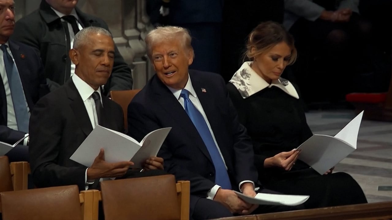 Current and former U.S. presidents greet each other at Carter funeral