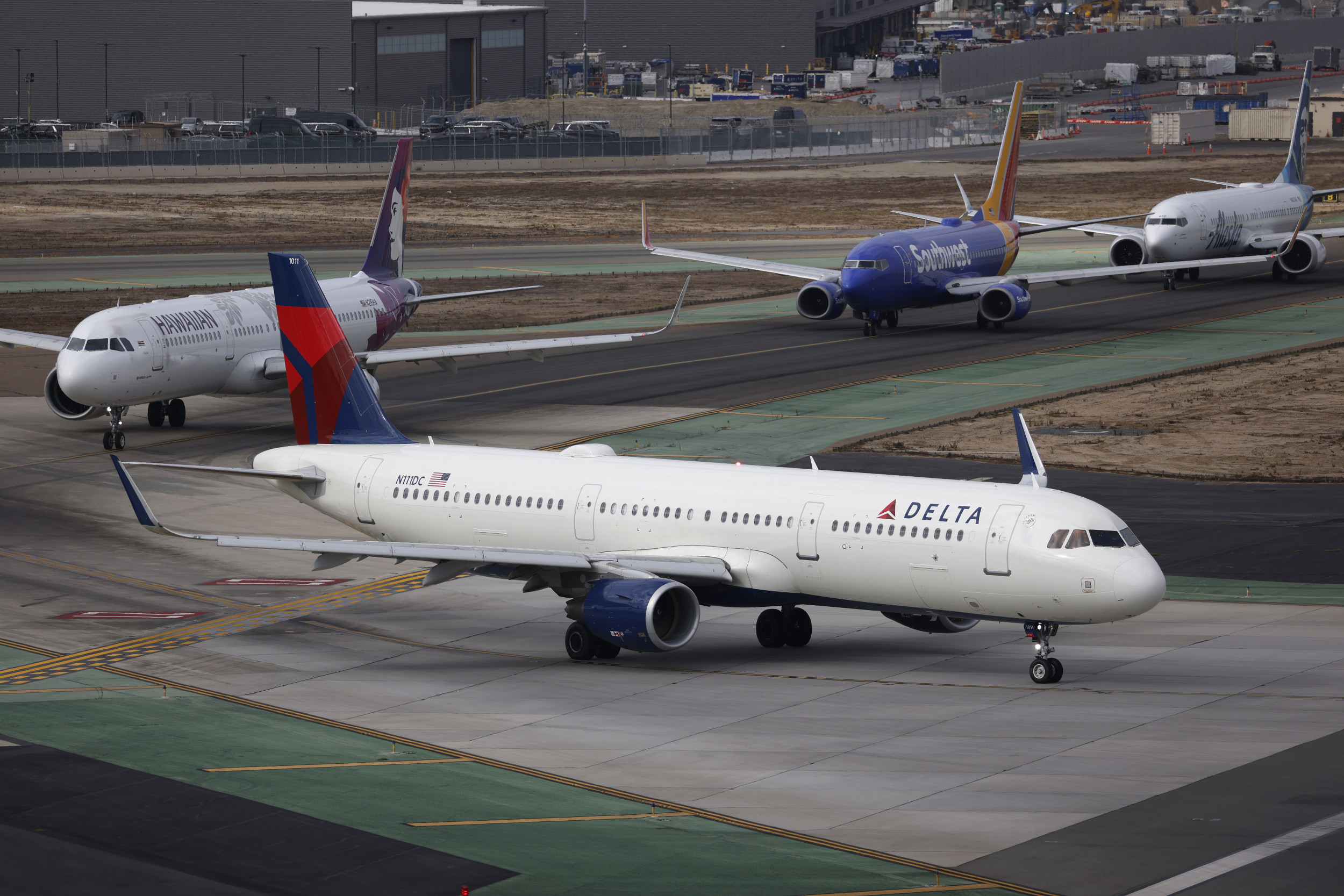 Delta Passengers Evacuate Flight Via Slide in Atlanta After Engine Issue
