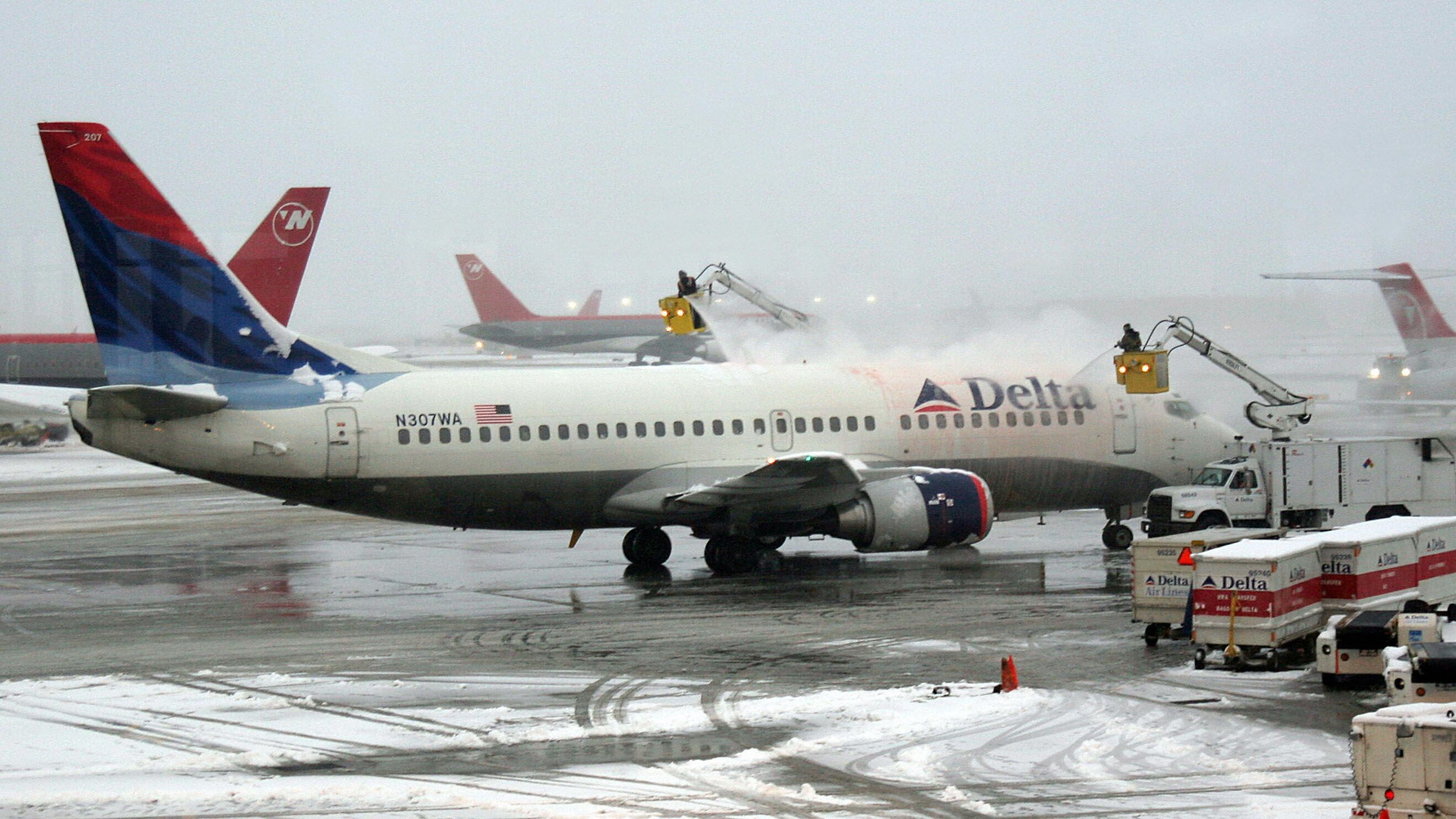 Passengers Evacuate on Slides After Delta Flight Catches Fire