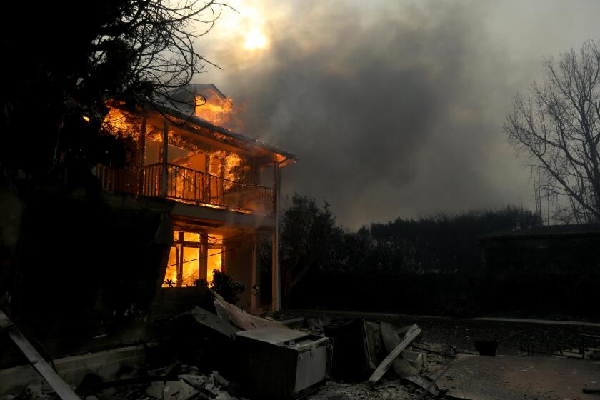 Their houses burned down. Now, they are fighting for the few homes left ...