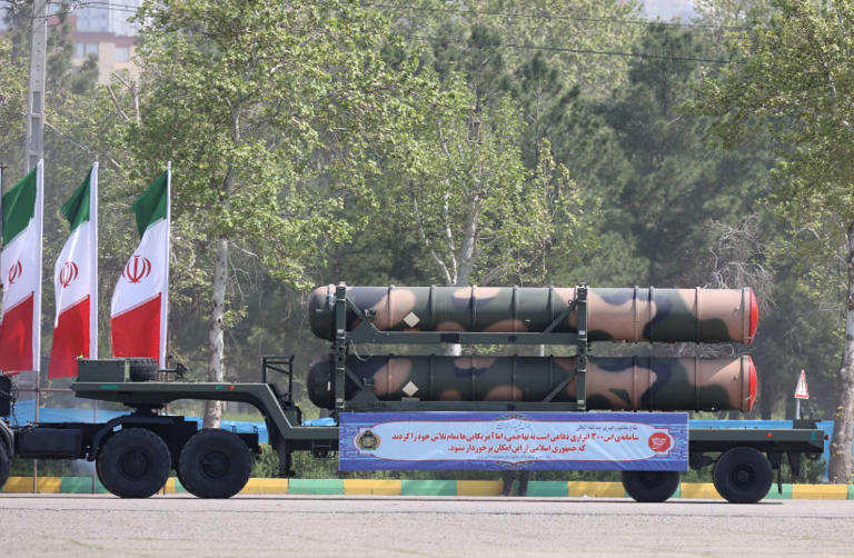 Iran unveils hidden underground missiles facility