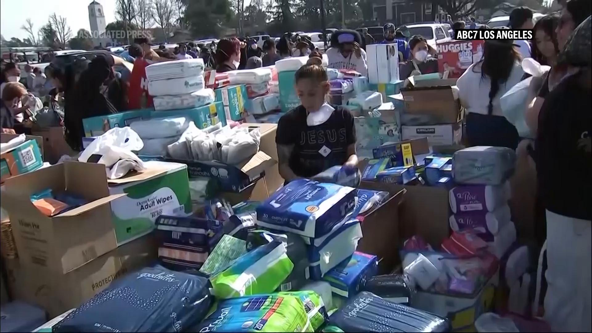 Volunteers gather at donation centers to help those affected by ...