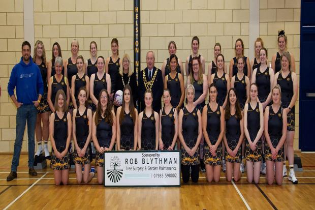 Ladies sports teams net new match dresses thanks to local generosity
