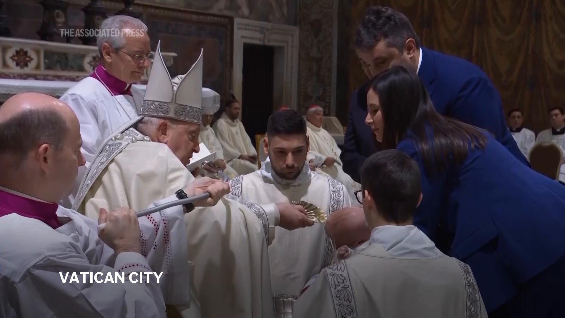 Pope Francis baptizes 21 babies in annual ceremony at Sistine Chapel