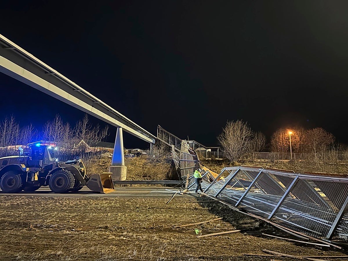 Strong winds knock down pedestrian bridge and close one of Alaska’s ...