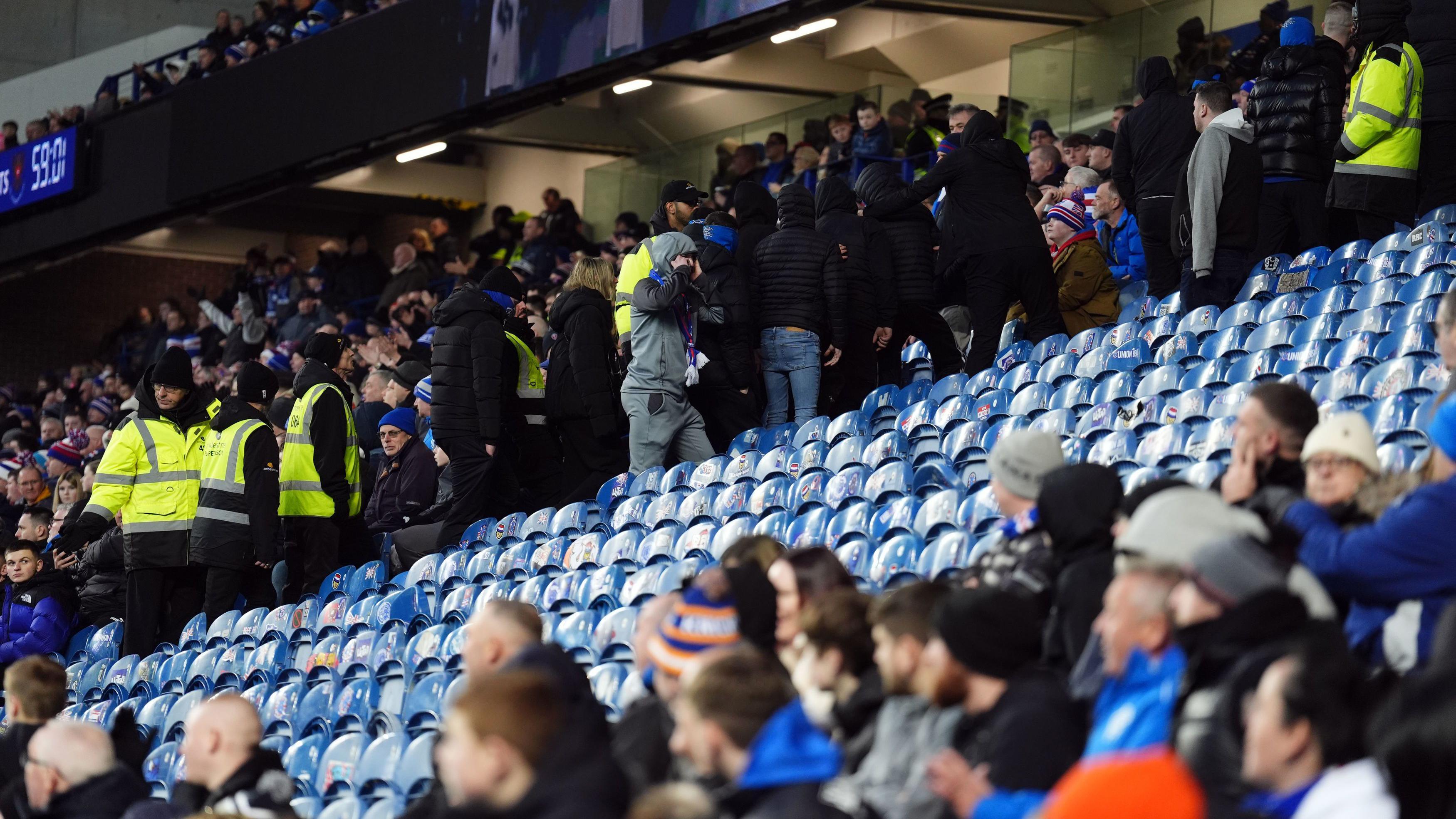 Fans split over walk-out protest as Rangers boss urges unity