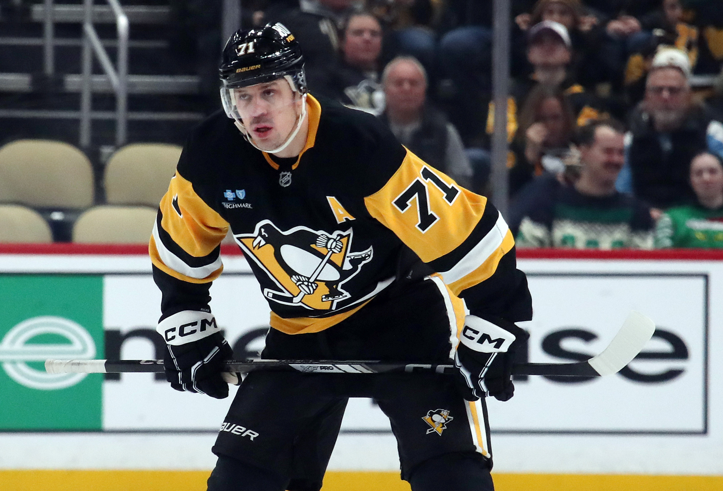 Penguins place star center on IR