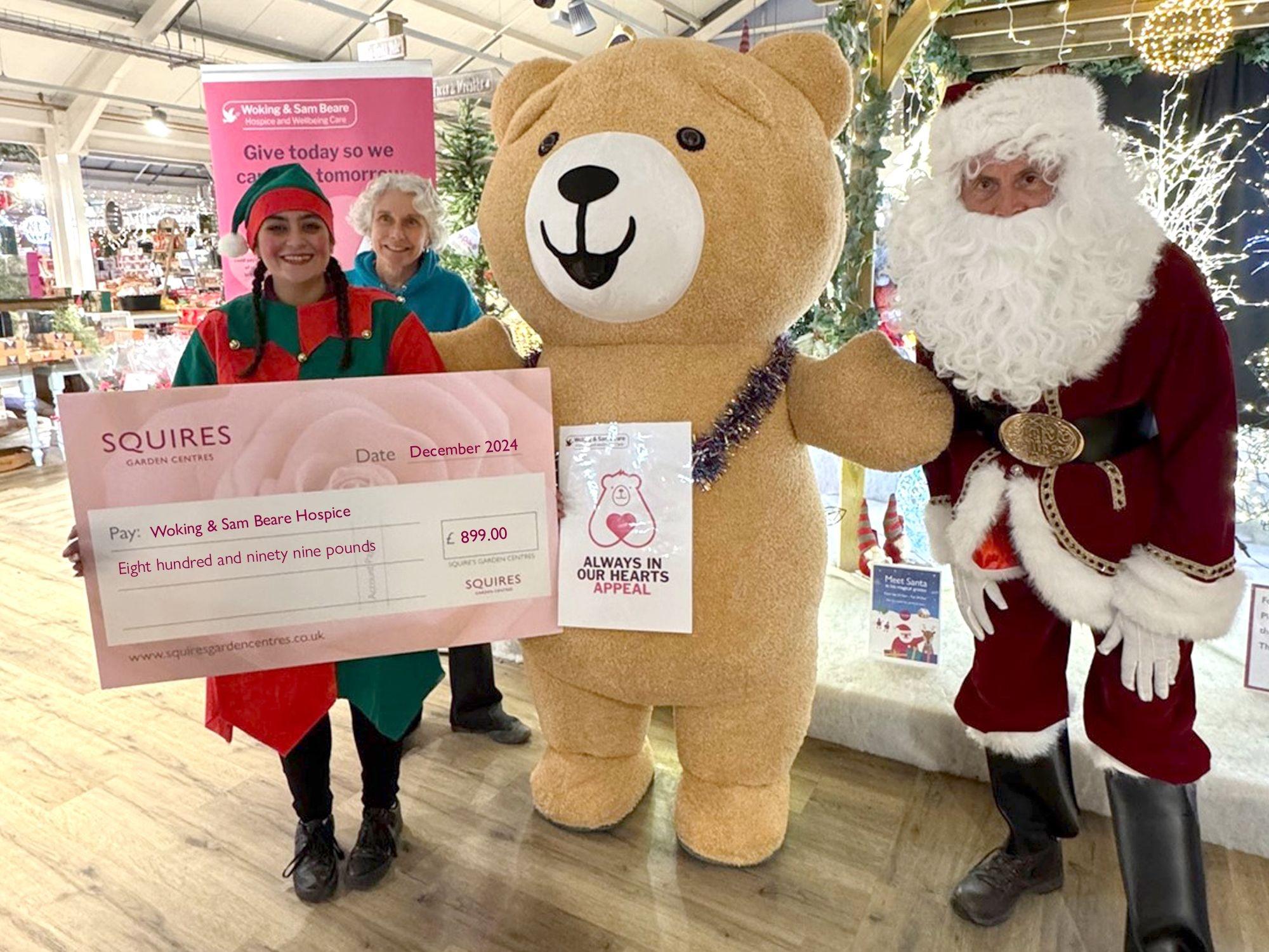 Squire's Woking spreads new year cheer with donation to Woking and Sam ...