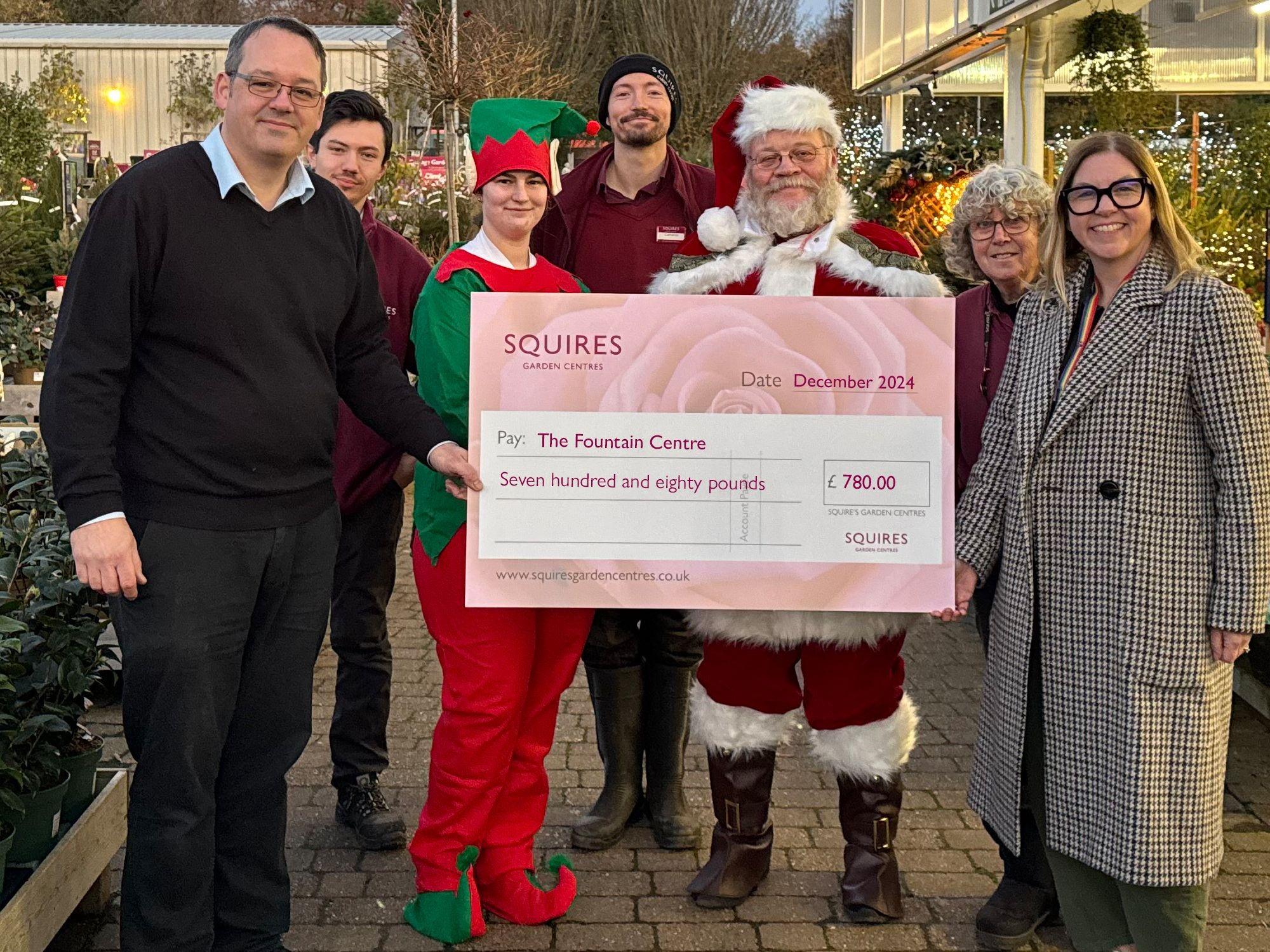 Squire's Milford spreads new year cheer with donation to the Fountain ...