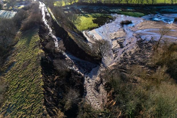 Plan to refloat boats stranded after devastating flooding on ...