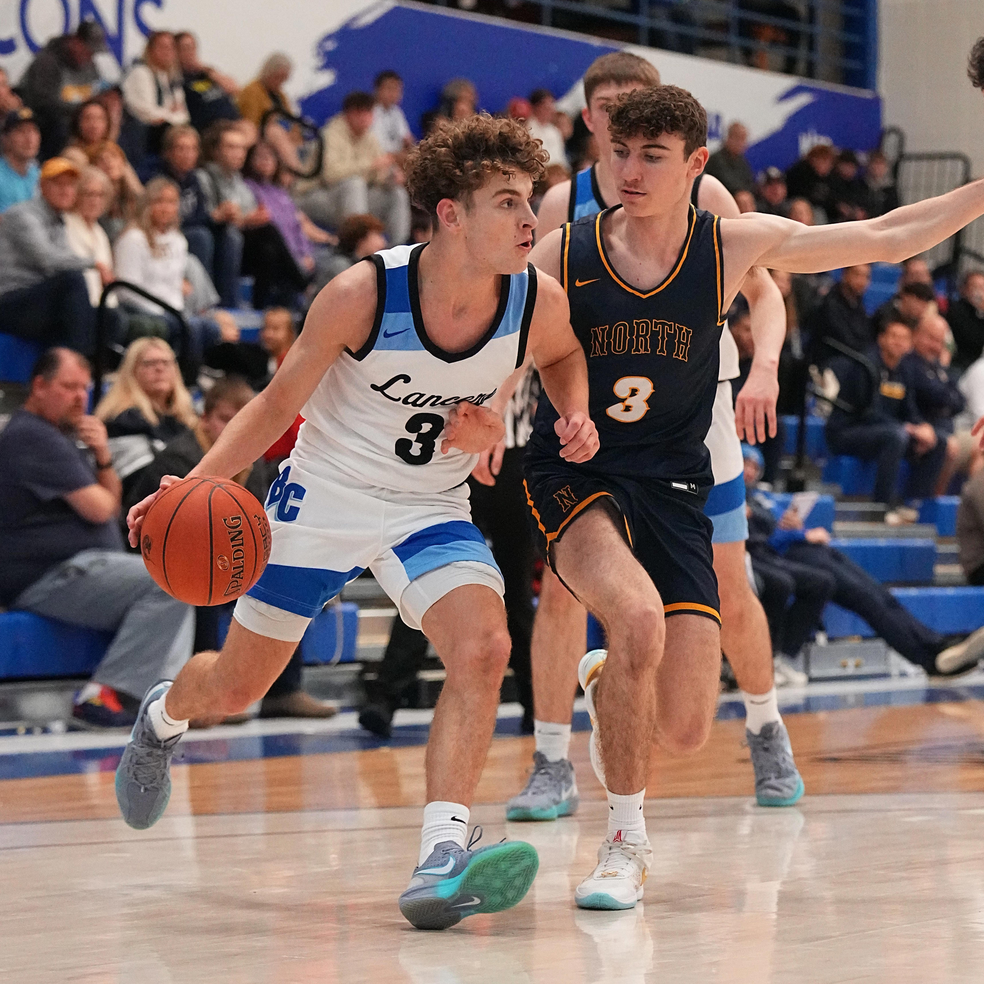 Slinger rises after top-five win in latest high school boys basketball ...