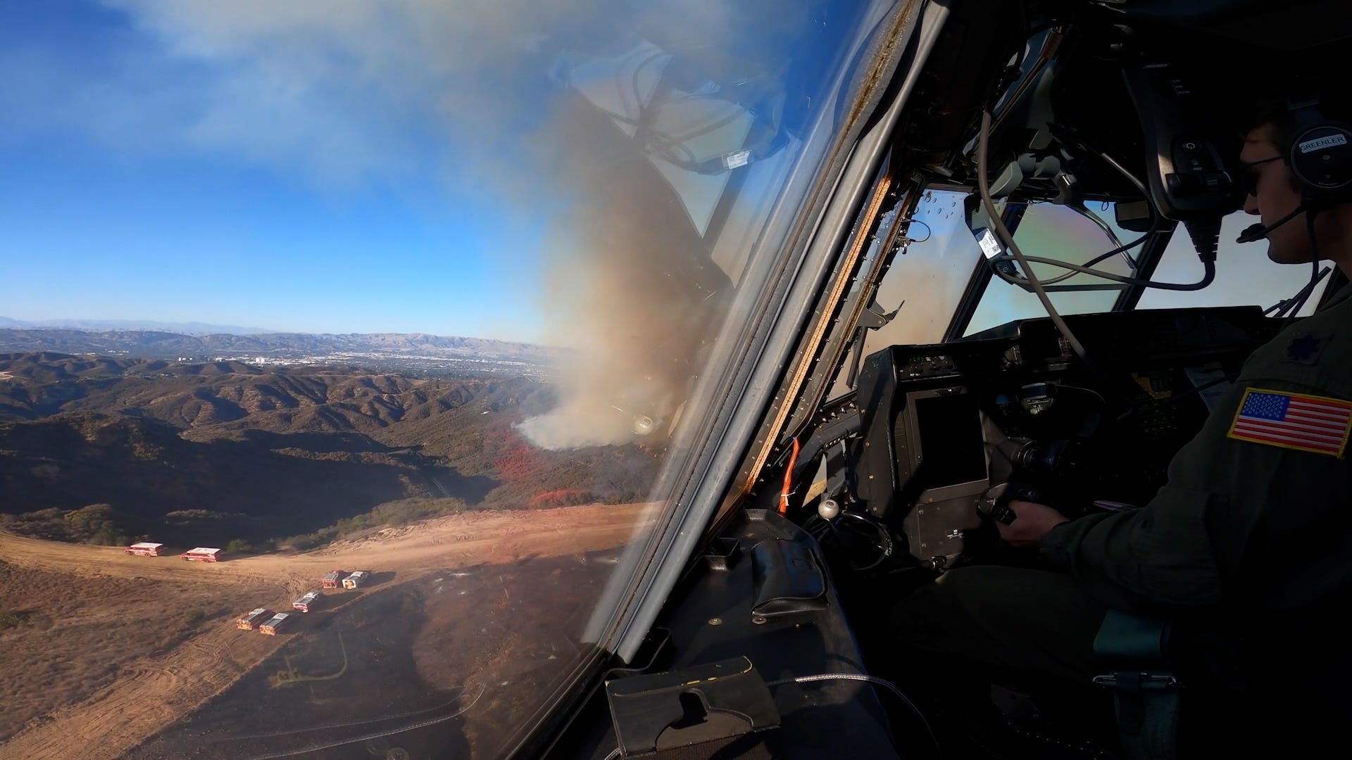 Video shows National Guard plane drop fire retardant on California wildfire