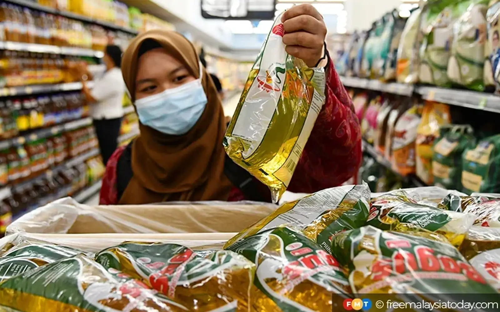 Foreigners barred from buying subsidised cooking oil packets from March 1