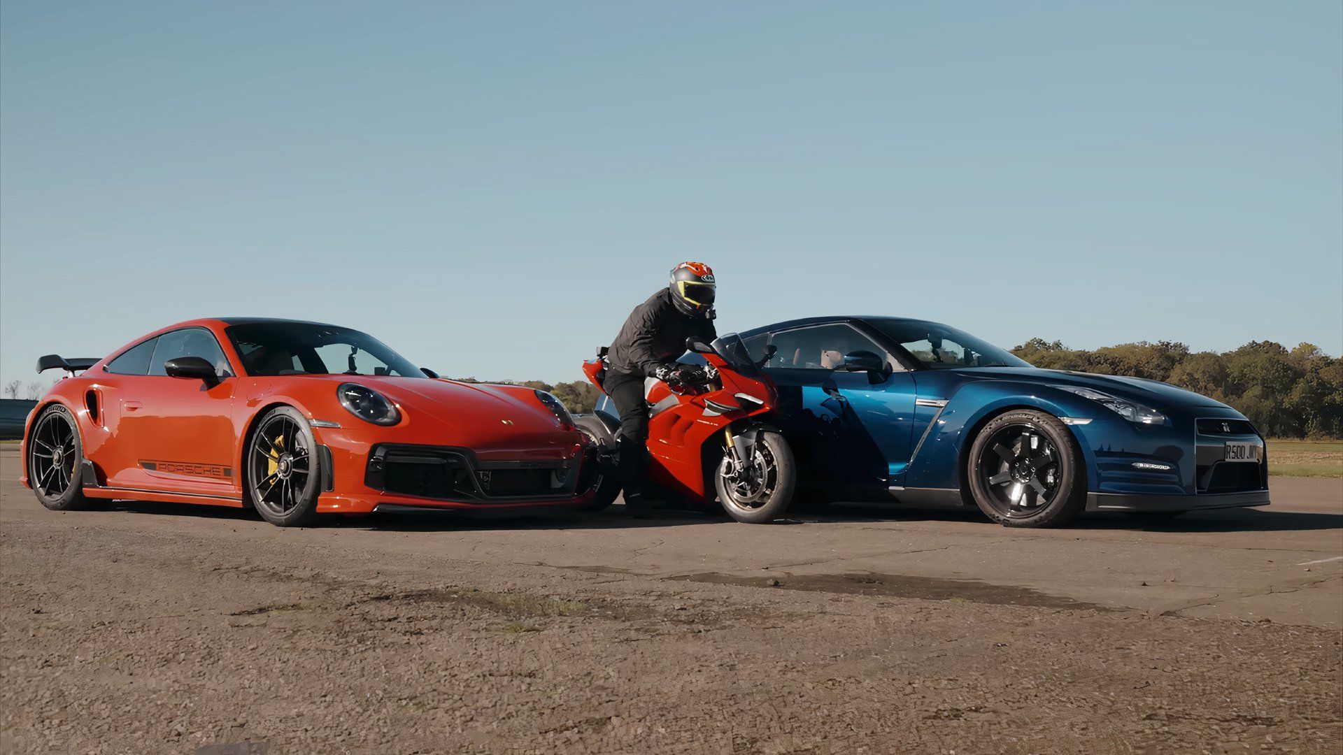Watch: 1,100-HP GT-R And 1,000-HP 911 Turbo S Take On A 225-HP Panigale V4S