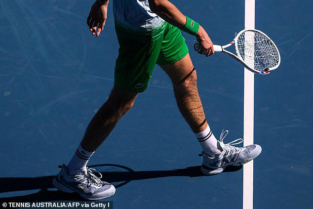 Russian tennis star Daniil Medvedev breaks his racquet - AND the net ...