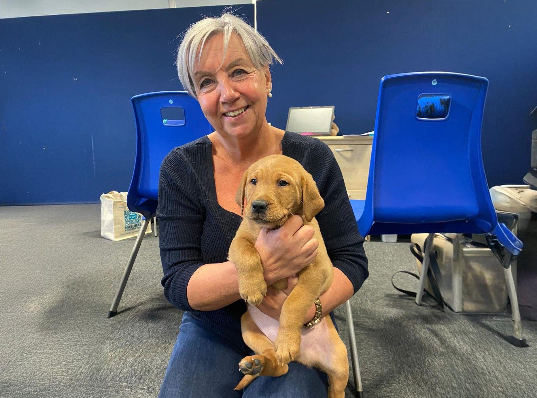 Trainee assistance dogs help volunteer couple through health ordeal