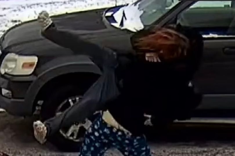 Moment Ohio woman is body slammed onto icy road after punching man in ...