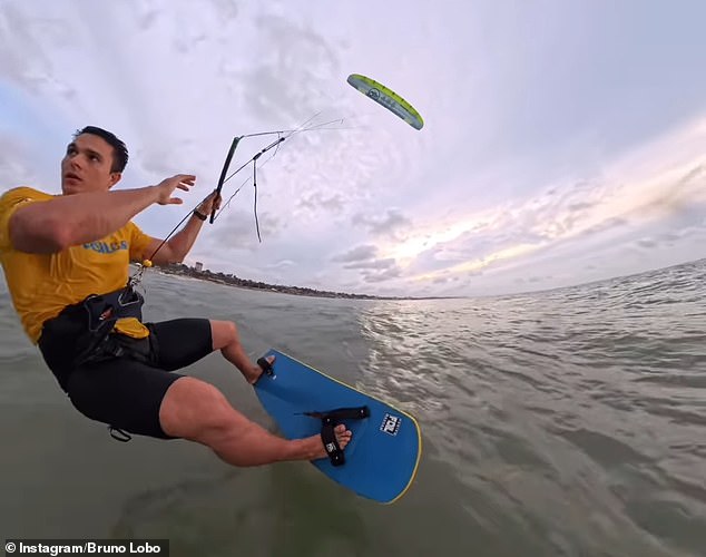 Heart-stopping moment Olympic kitesurfer swoops in to rescue drowning girl