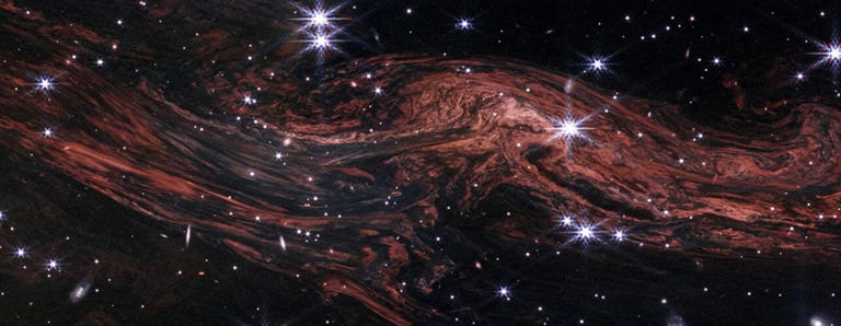 Webb reveals intricate layers of interstellar dust and gas