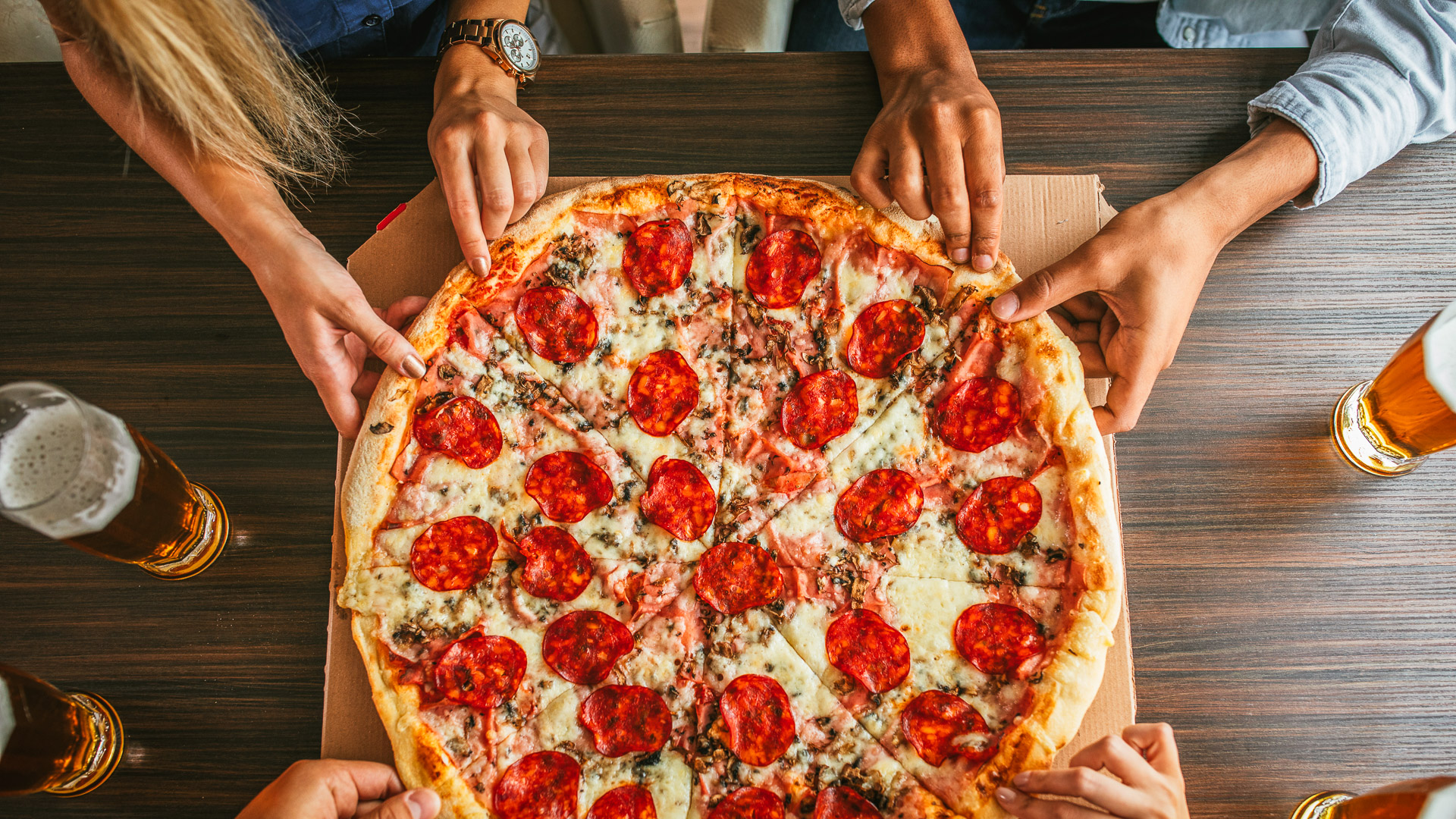 A Large Pizza Costs $18 at the Most Expensive Chain: How That Compares ...